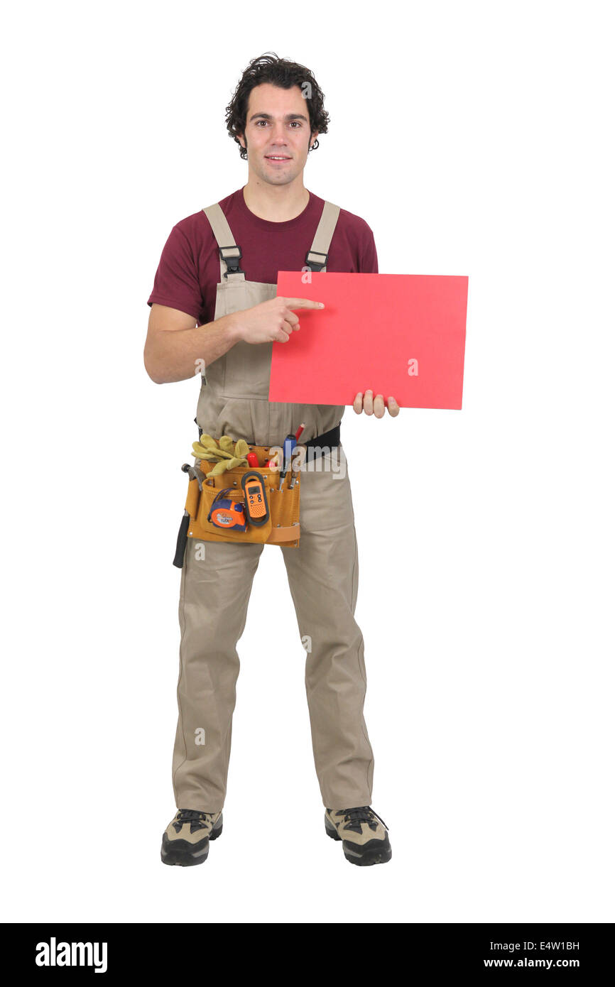 Handyman pointing poster Cut Out Stock Images & Pictures - Alamy
