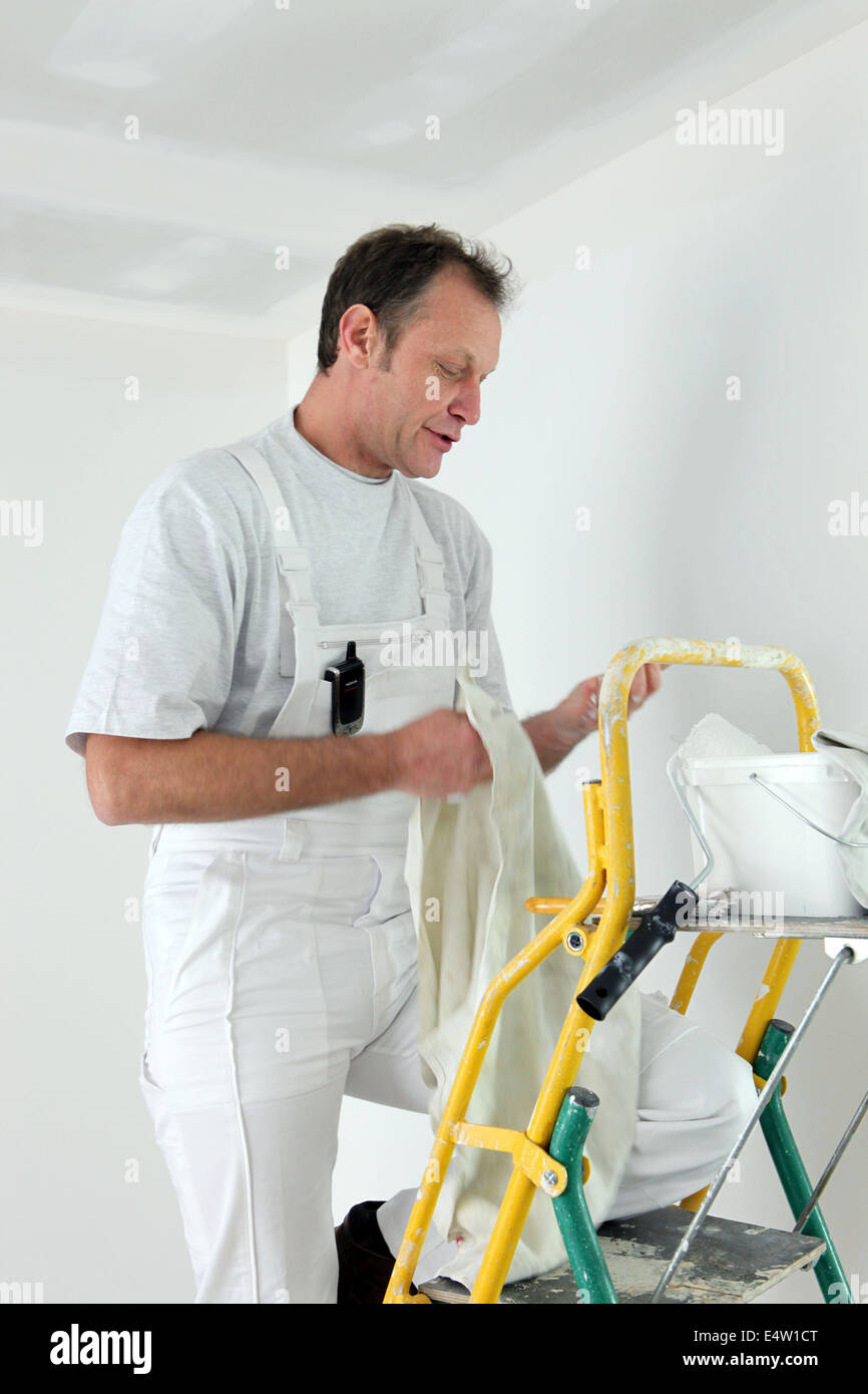 Painter holding a cloth Stock Photo - Alamy