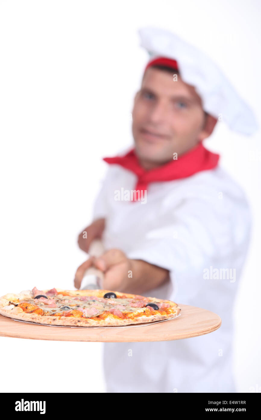 Pizza chef with a wooden board Stock Photo - Alamy