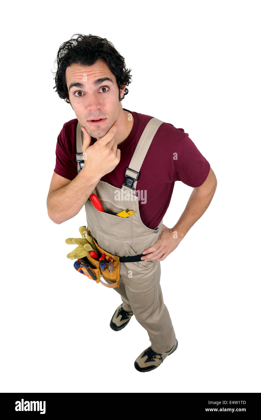 Carpenter with his hand on his chin Stock Photo - Alamy