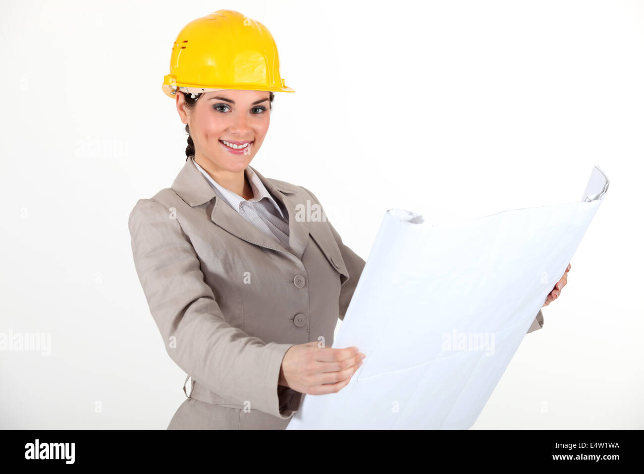 Engineer examining a technical drawing Stock Photo - Alamy
