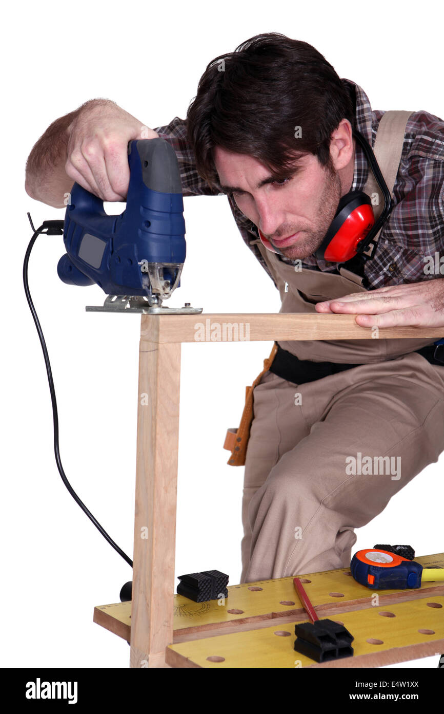 carpenter using sander machine Stock Photo - Alamy