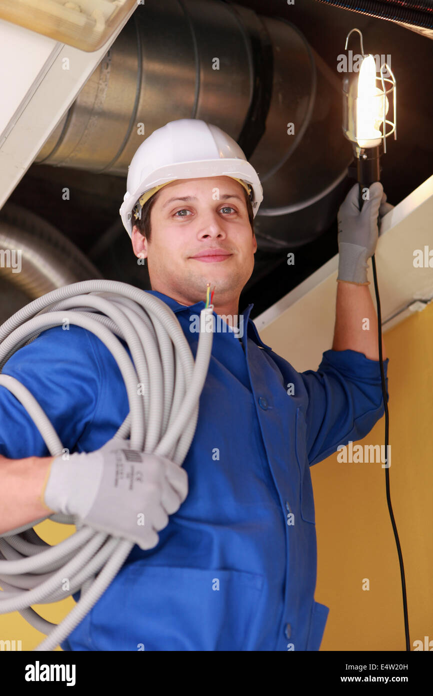 Working on lighting Stock Photo - Alamy