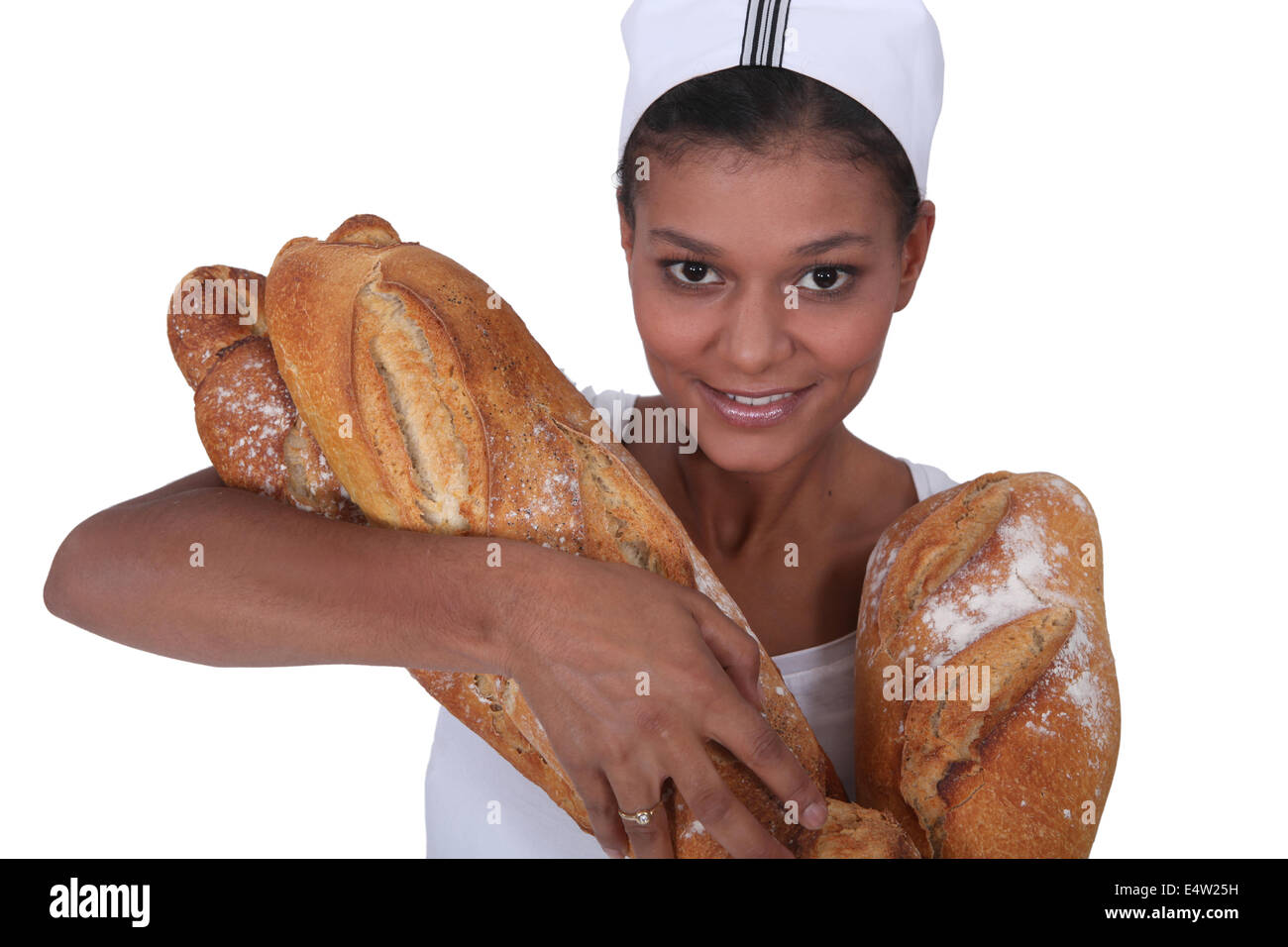 Bakery worker with bread Stock Photo - Alamy