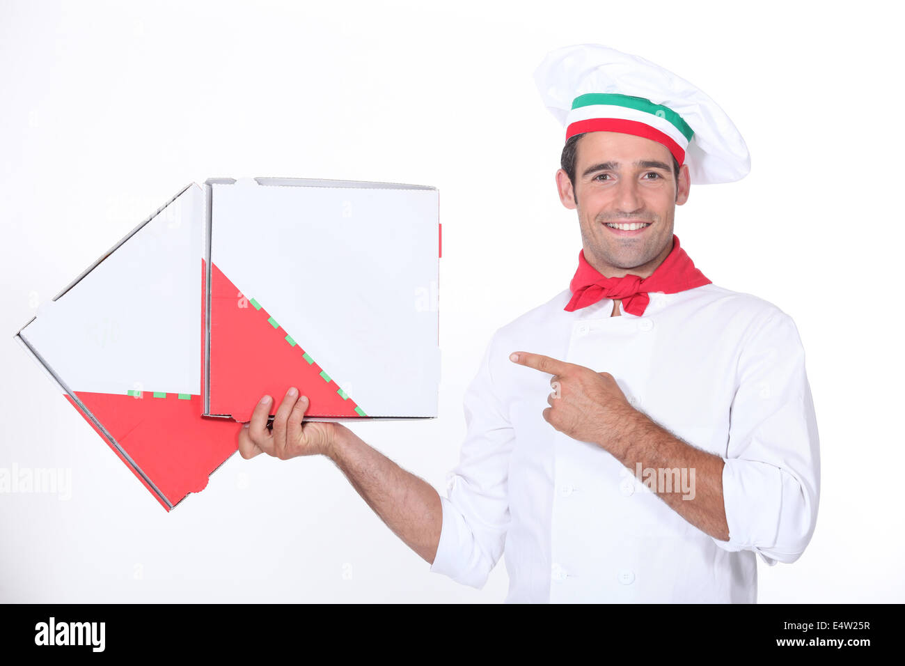 Chef pointing at pizza boxes Stock Photo - Alamy