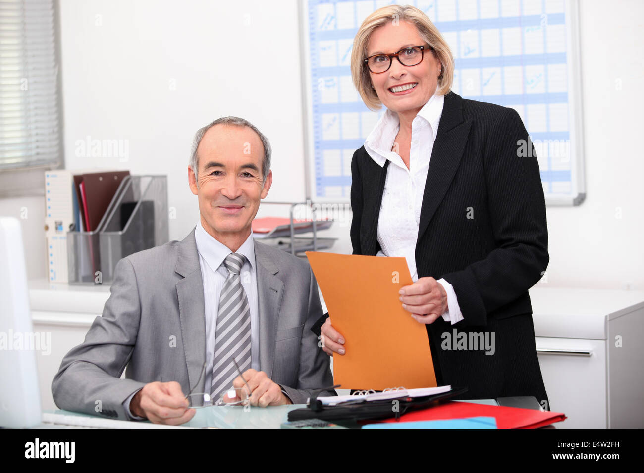 Together working duo hi-res stock photography and images - Alamy