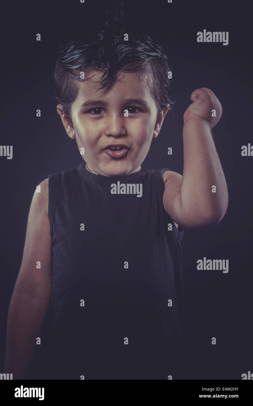 singer boy dressed rocker with funny faces Stock Photo - Alamy