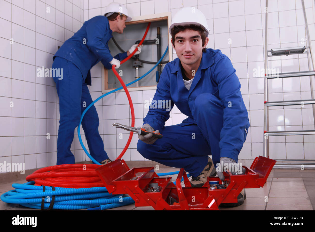Man ladder plumbing tools hi-res stock photography and images - Alamy