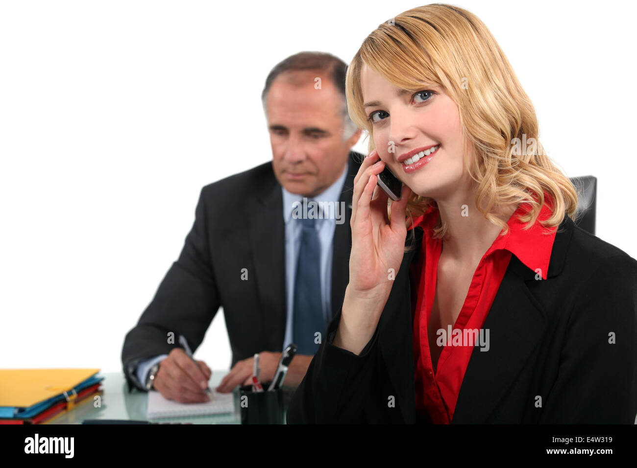 Young assistant with boss Stock Photo - Alamy