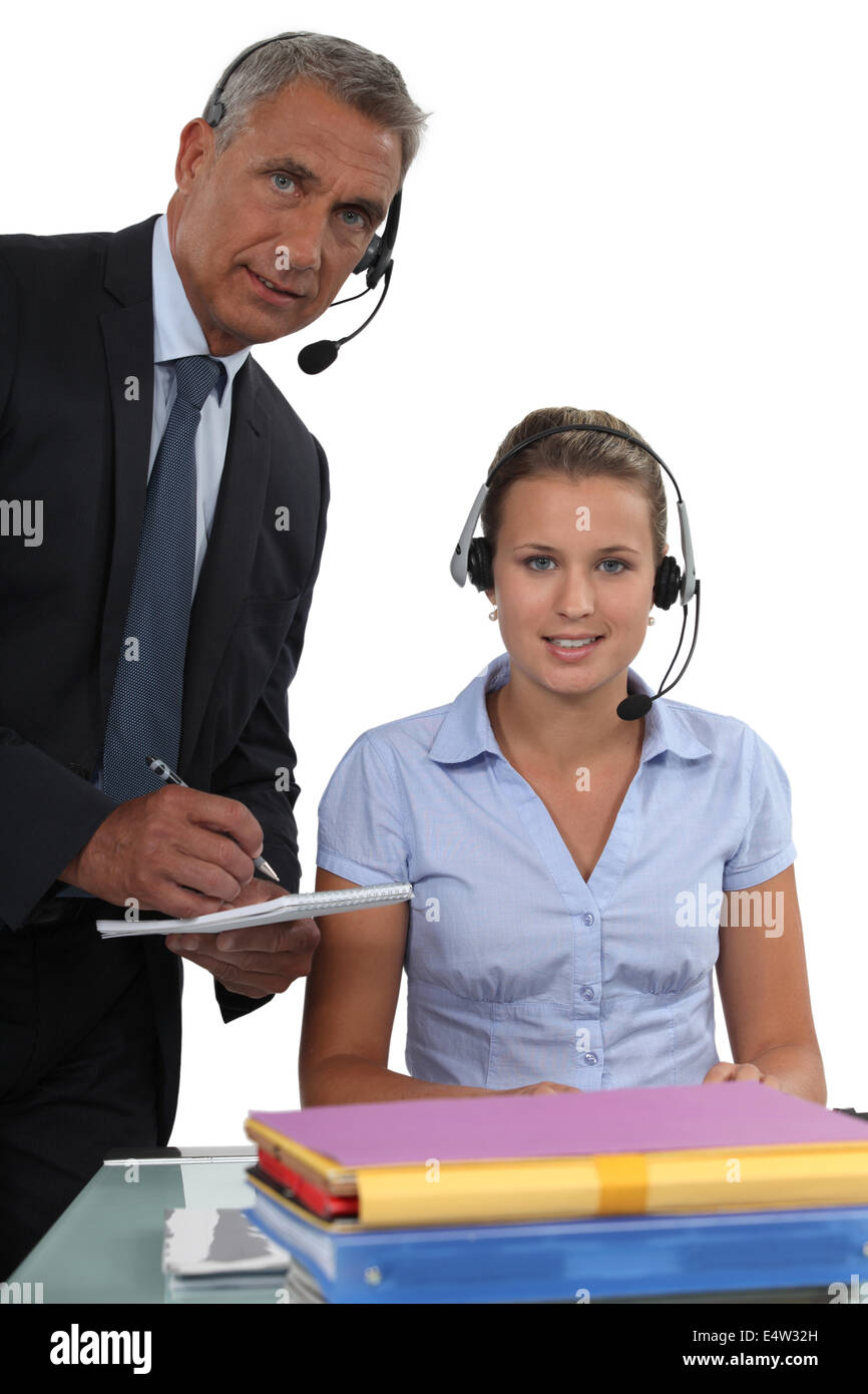 Call-center boss with colleague Stock Photo - Alamy