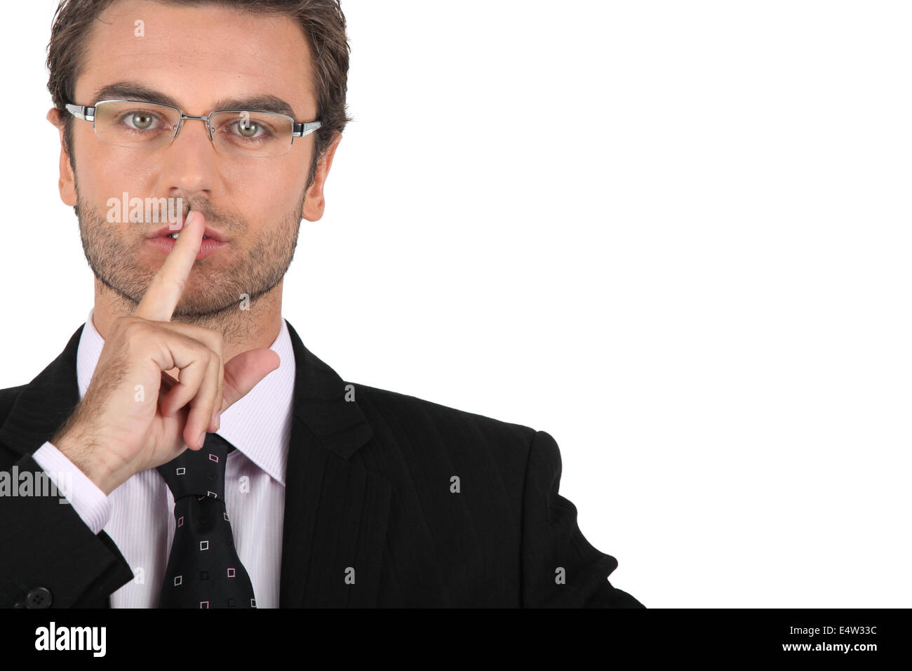 Smart man asking for silence Stock Photo - Alamy