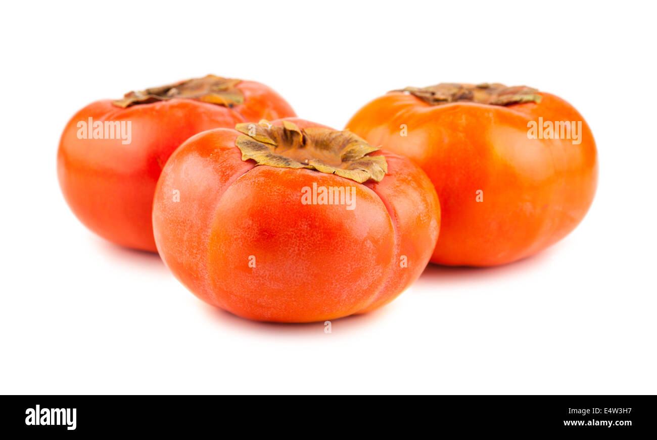 Three ripe persimmons Stock Photo - Alamy