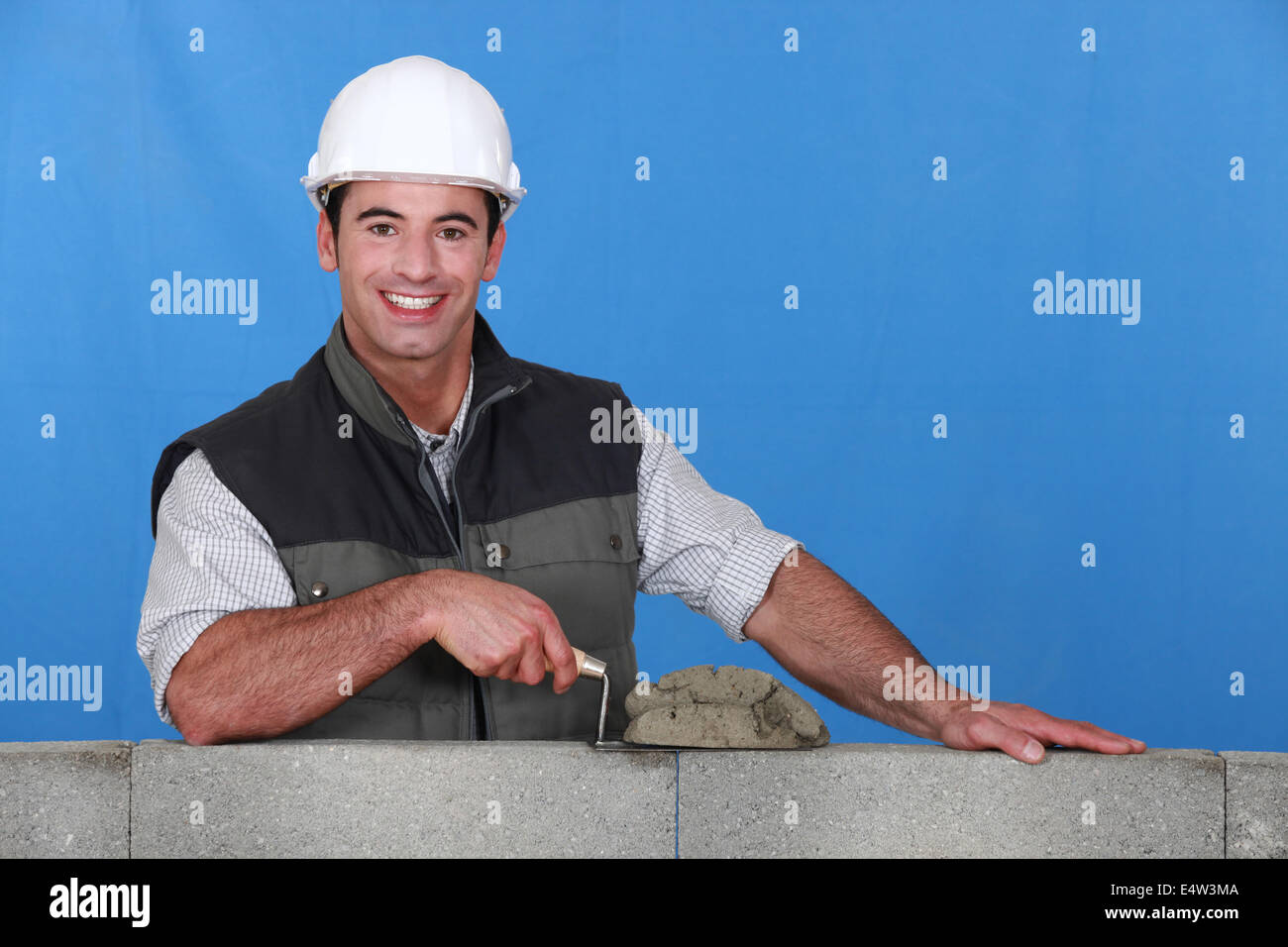 Laying concrete bricks hi-res stock photography and images - Alamy