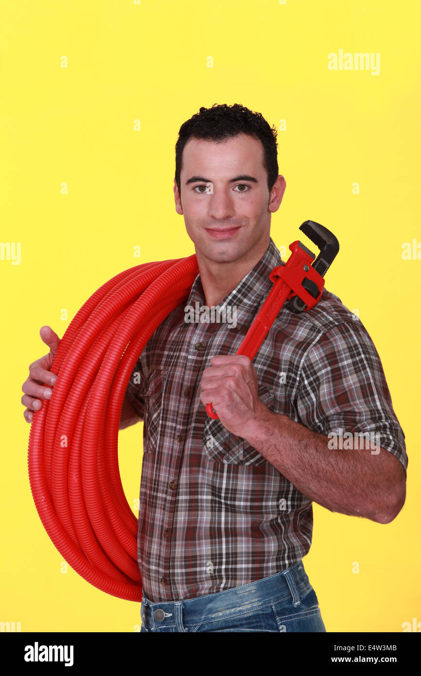 A handsome plumber Stock Photo - Alamy