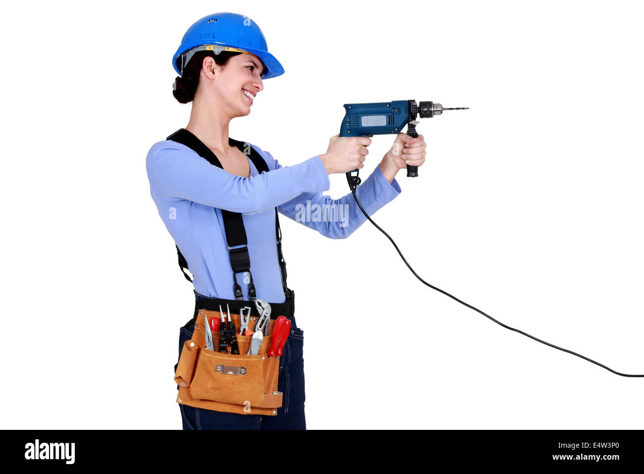 Construction worker holding screwdriver Stock Photo - Alamy