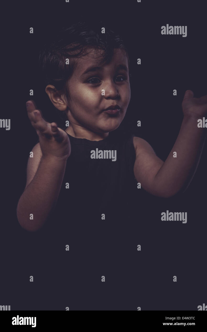 generation, Funny kid with funny faces dressed as a heavy Stock Photo ...