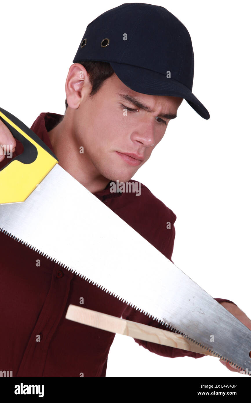 Man with a handsaw Stock Photo - Alamy