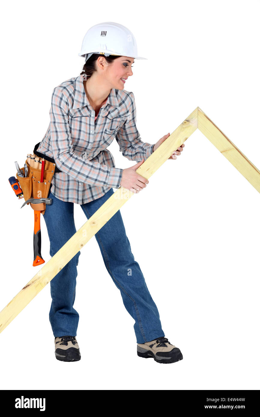 Female carpenter with wooden frame Stock Photo - Alamy