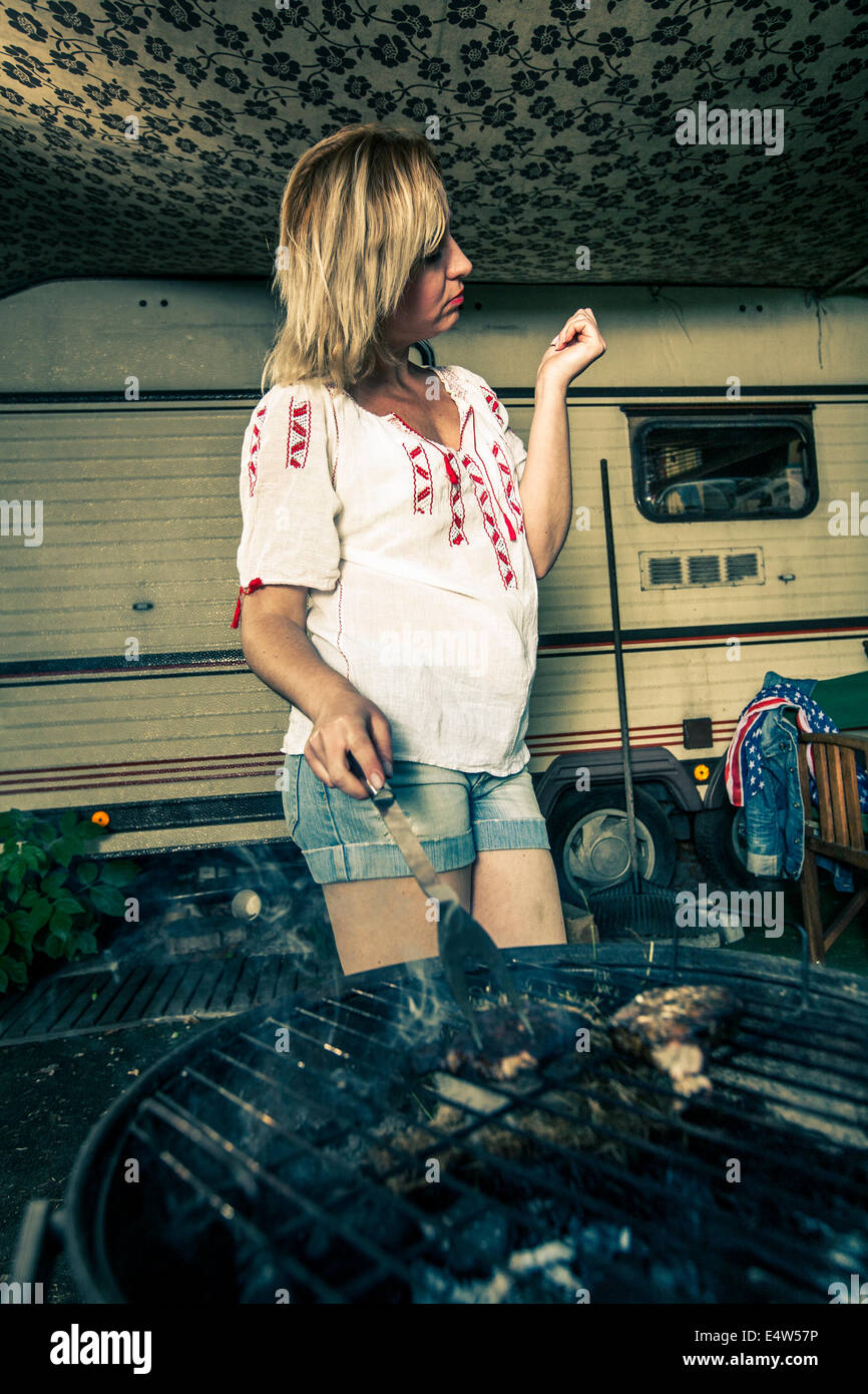 Blond woman BBQ by RV Stock Photo - Alamy