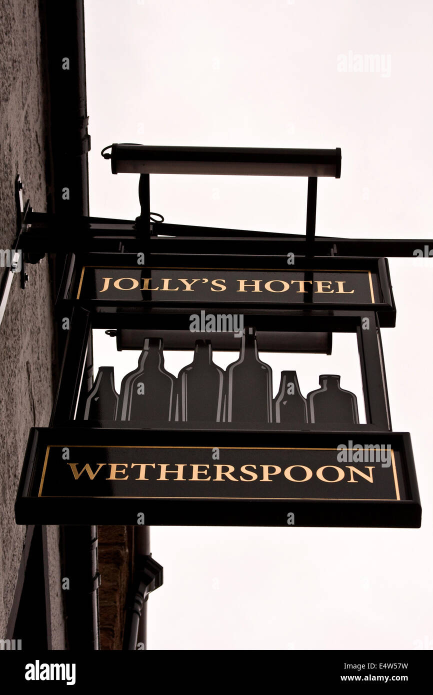 Portrait of the Jolly`s Hotel Wetherspoon Pub sign at Broughty Ferry in ...