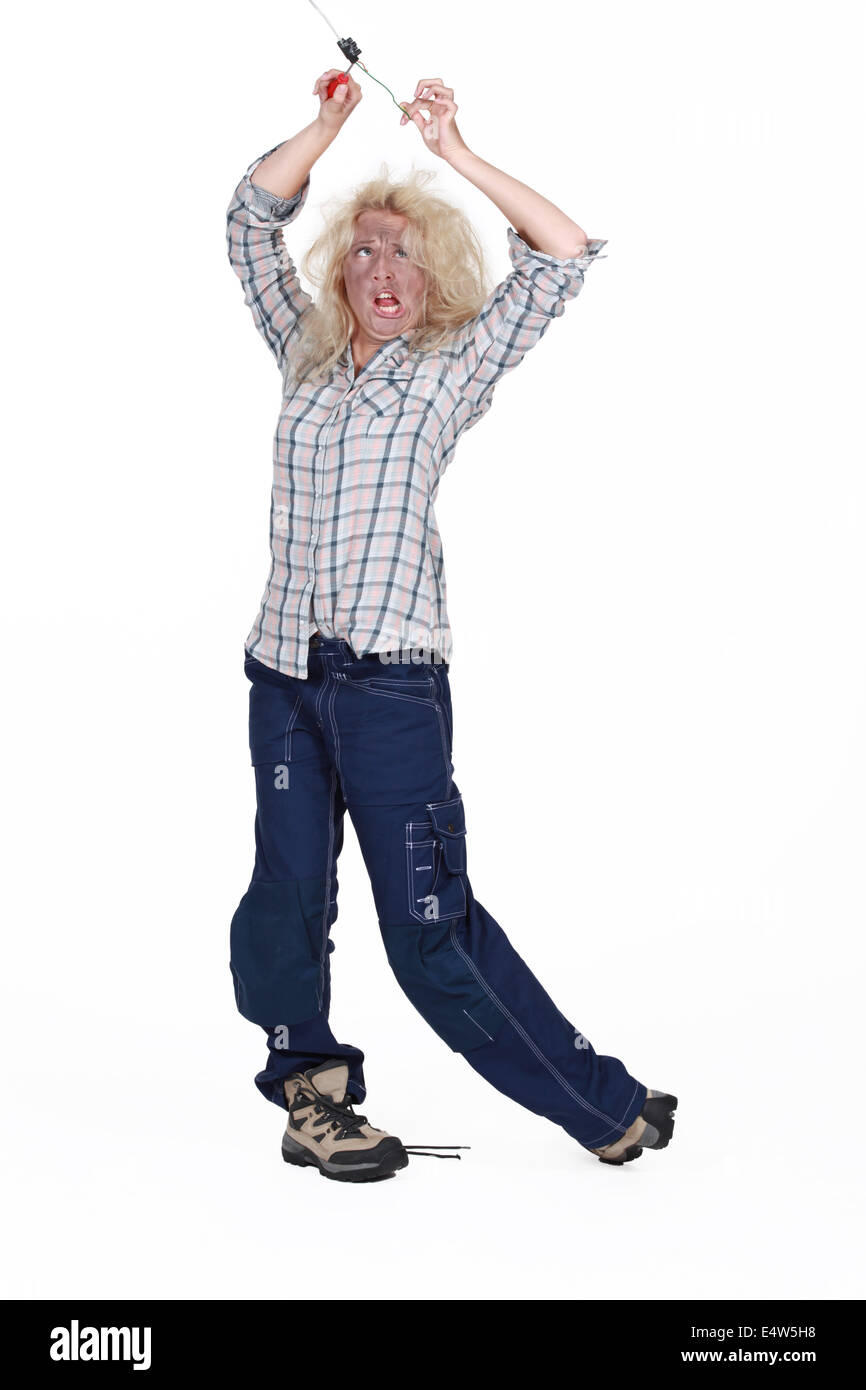 A woman being electrocuted Stock Photo - Alamy