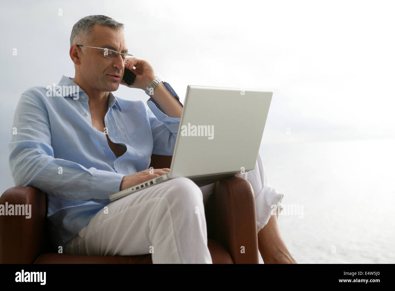 Man relaxed smile hi-res stock photography and images - Alamy