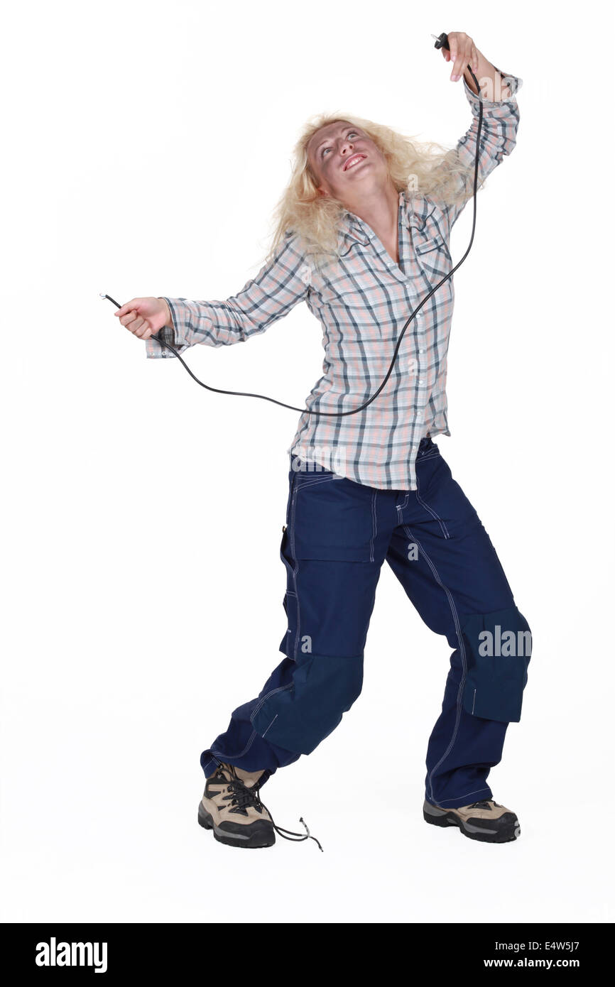 Woman suffering from electric shock Stock Photo - Alamy