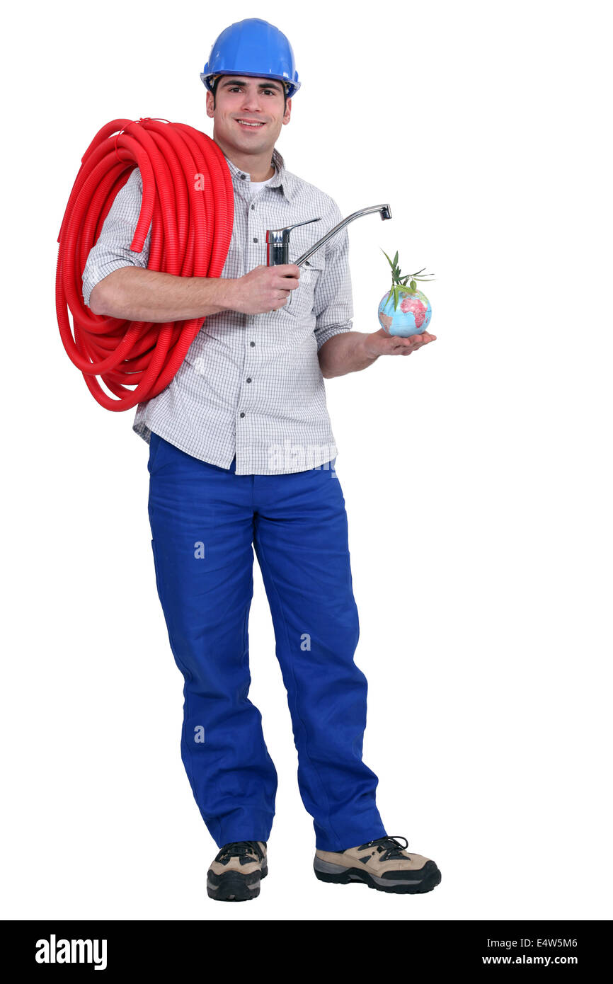 plumber carrying hose Stock Photo - Alamy