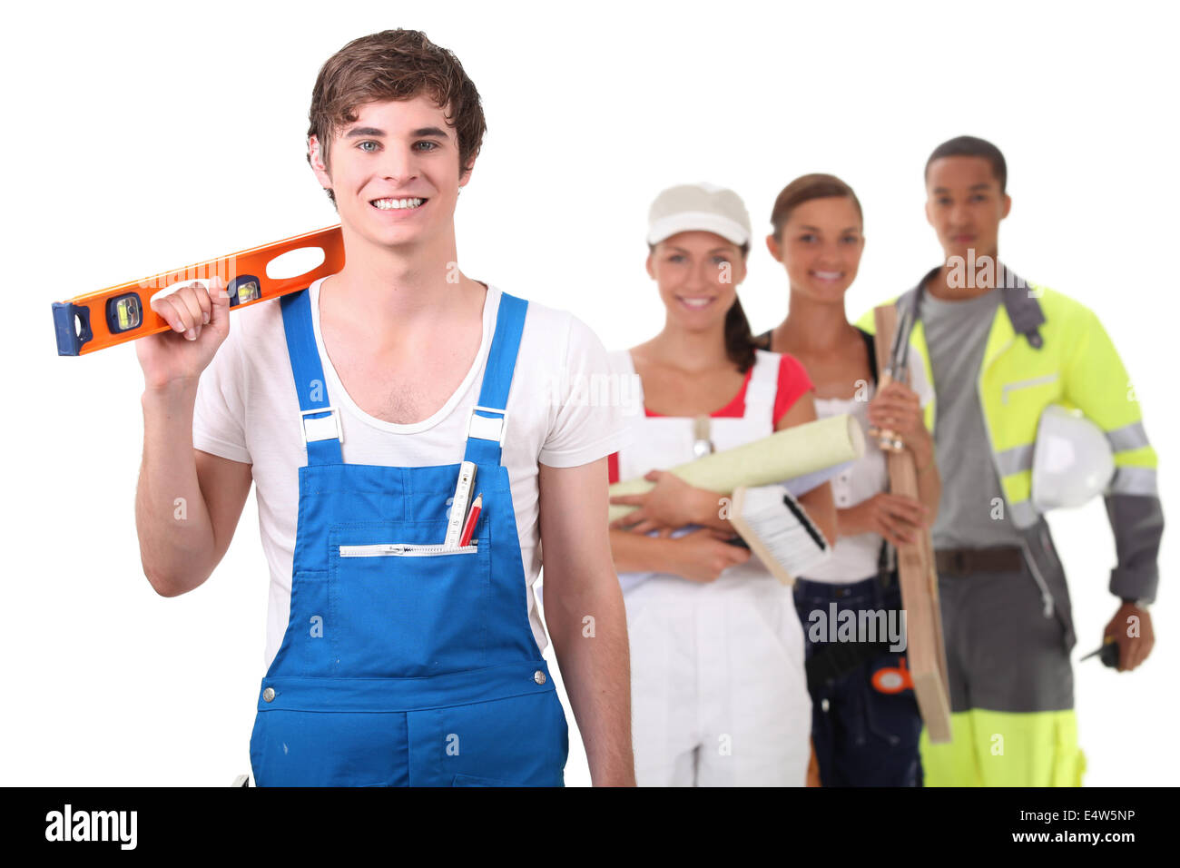 apprentice craftsman holding a level Stock Photo - Alamy