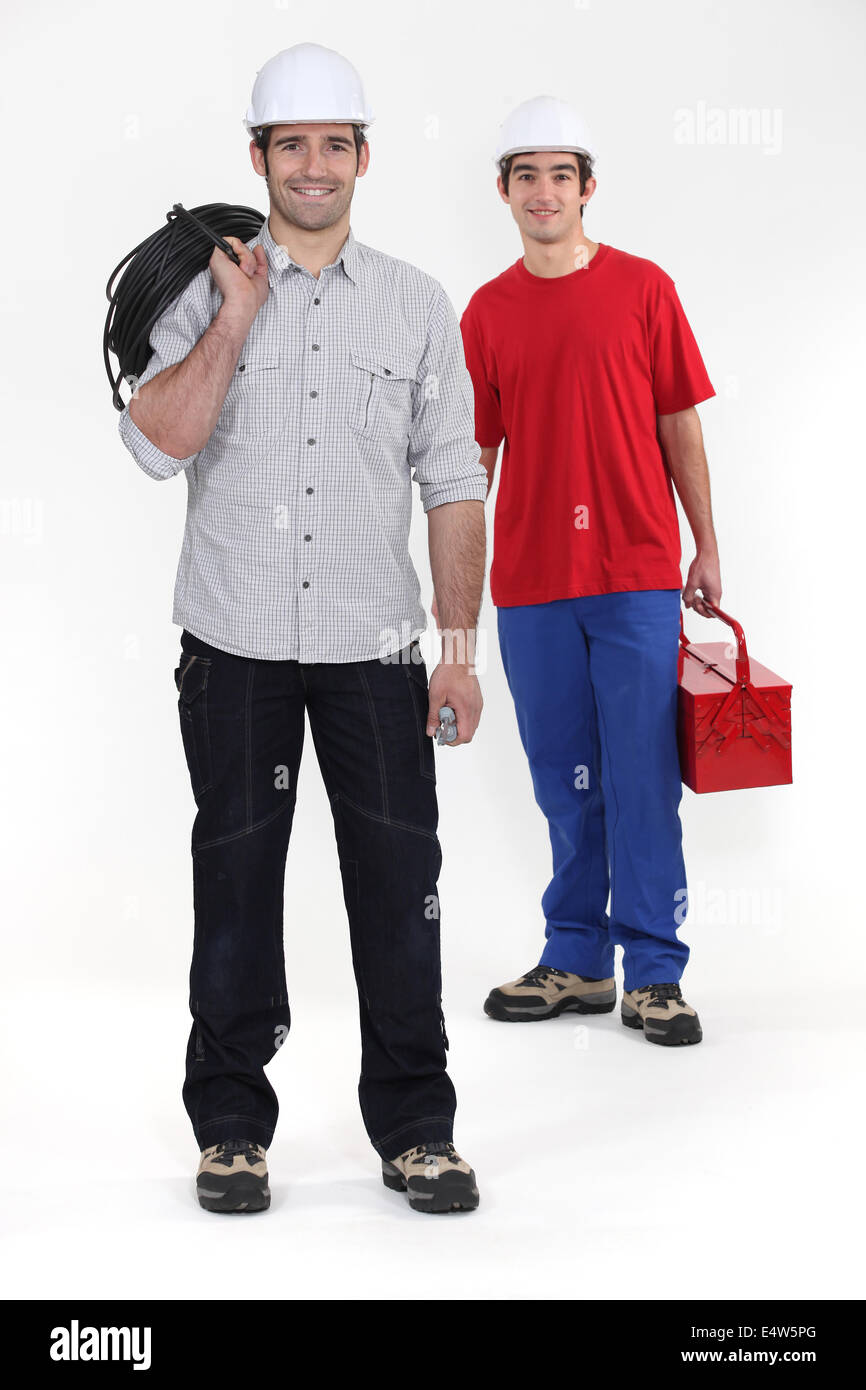 A team of tradesmen Stock Photo - Alamy