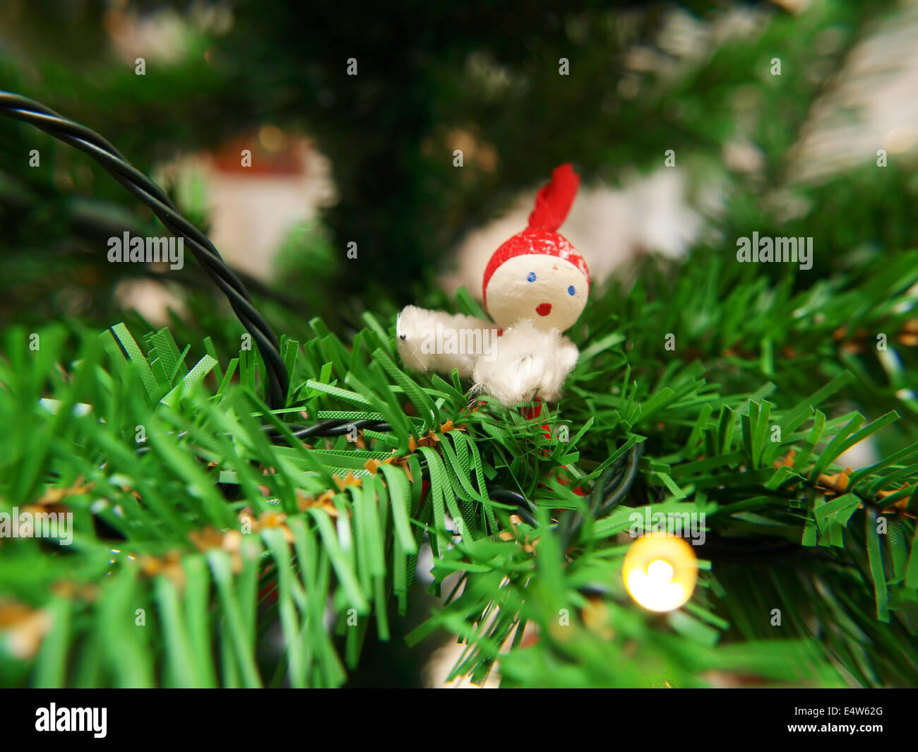 Little santa claus, in a Christmas tree Stock Photo - Alamy