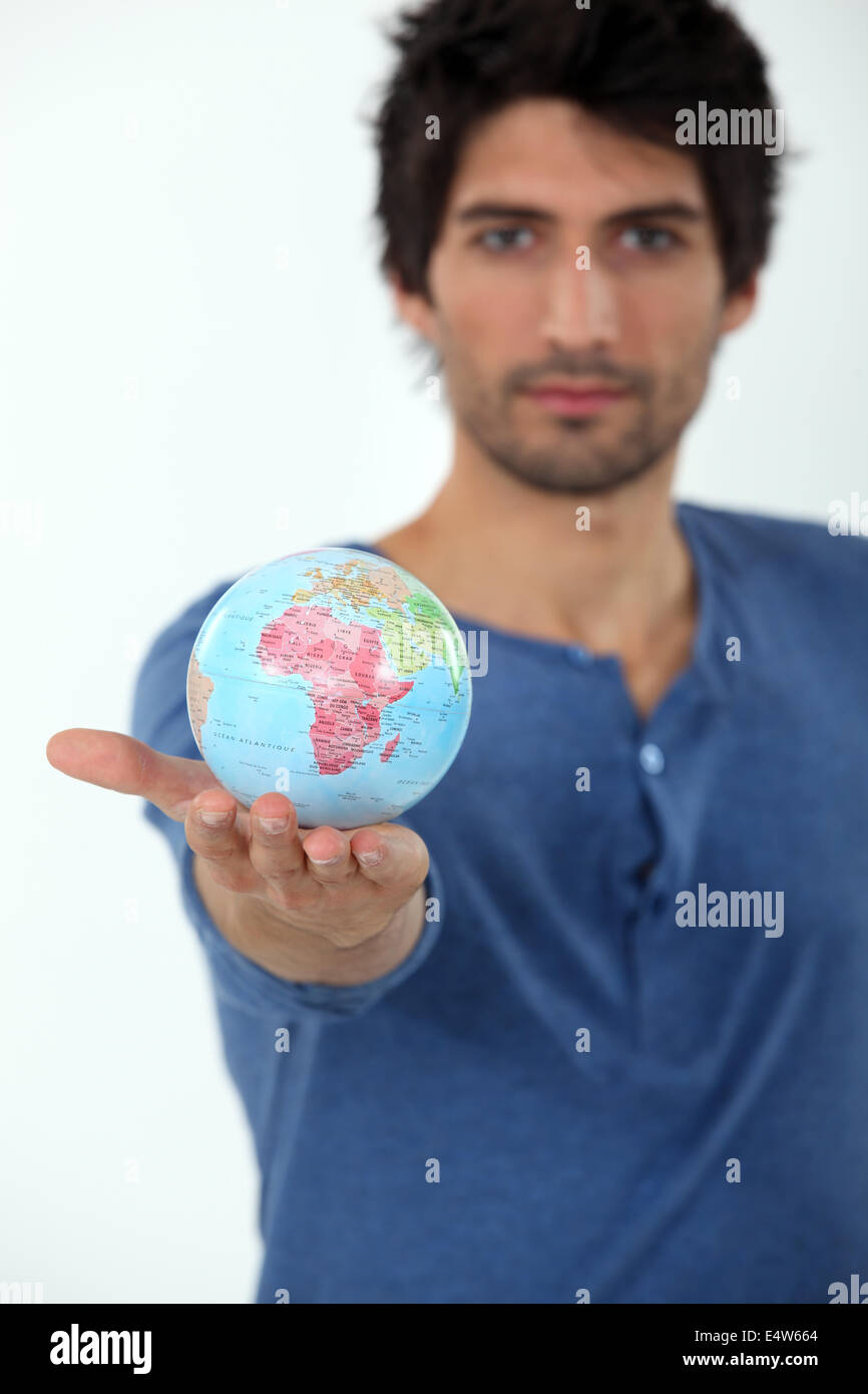 man holding a globe Stock Photo - Alamy