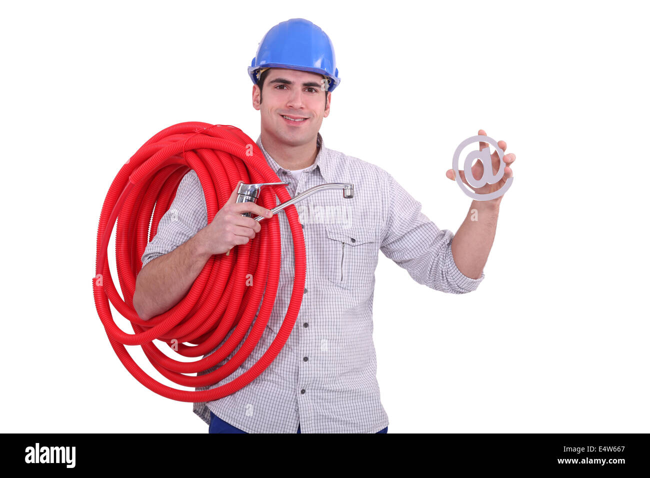 plumber showing an at sign Stock Photo - Alamy