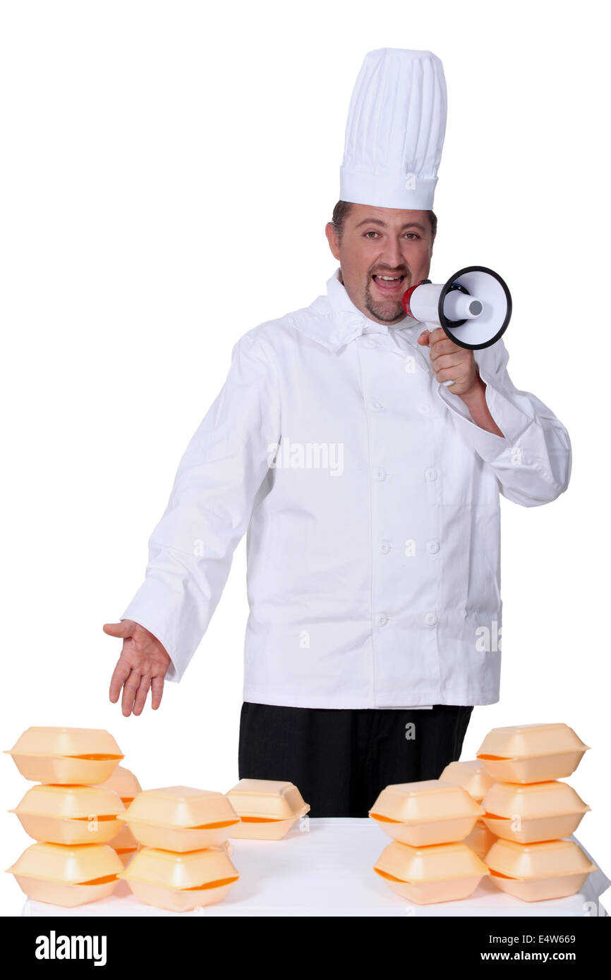 Male chef with megaphone Stock Photo - Alamy