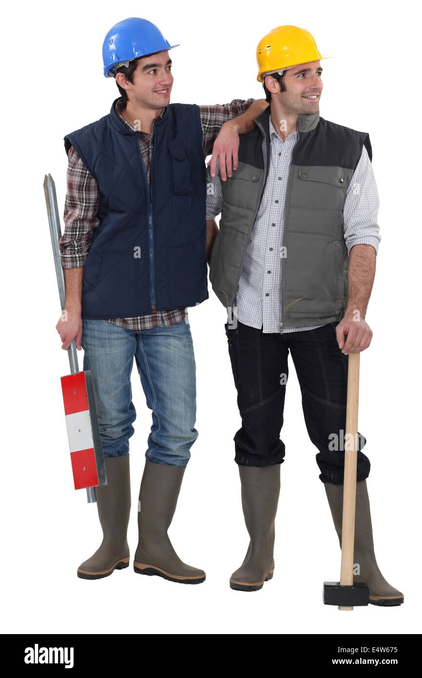 Two friendly male builders Stock Photo - Alamy