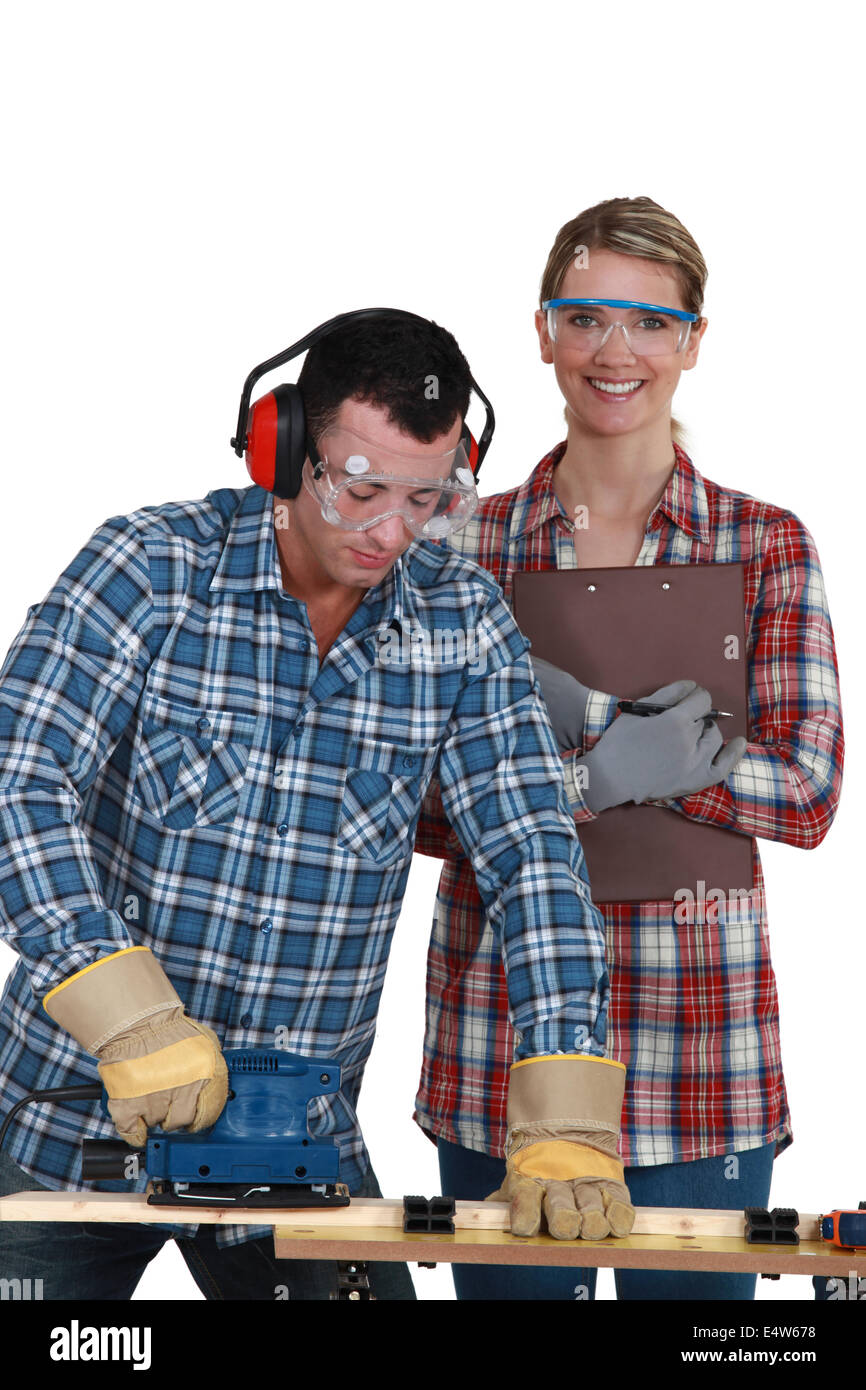male and female joiners working together Stock Photo - Alamy