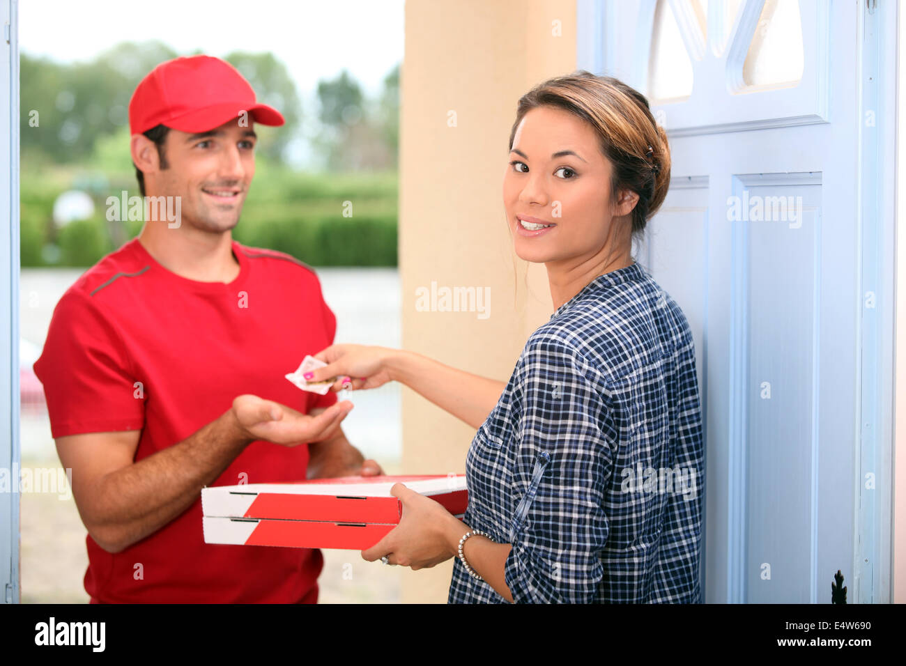 Man delivering pizza Stock Photo - Alamy
