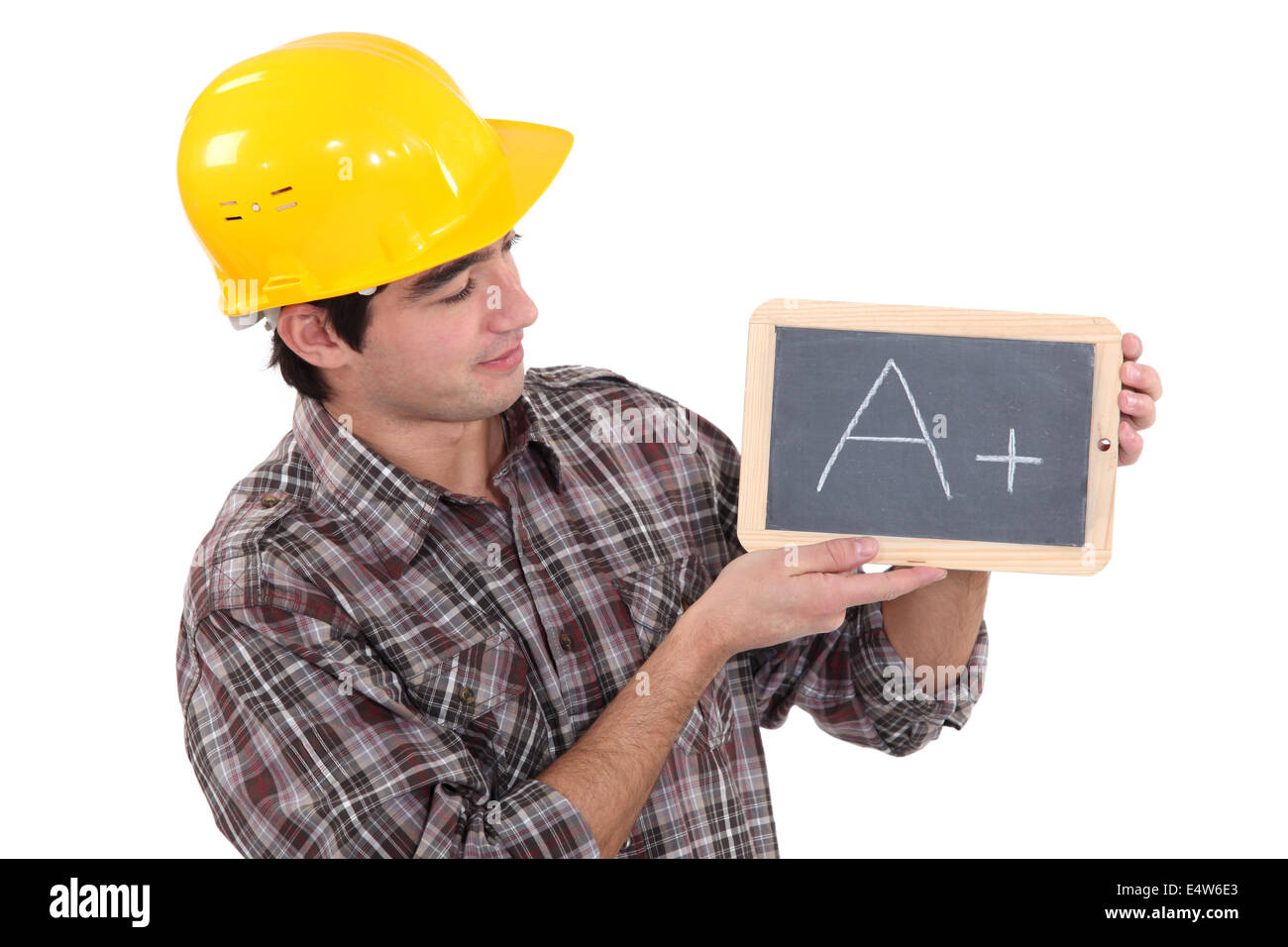 young apprentice holding slate Stock Photo - Alamy