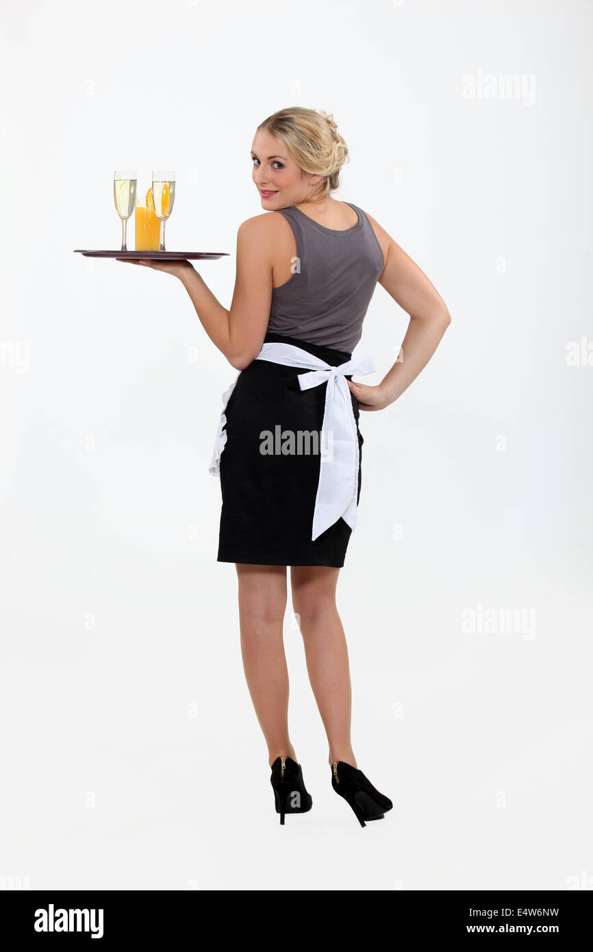 Female waitress carry tray of food hi-res stock photography and images ...