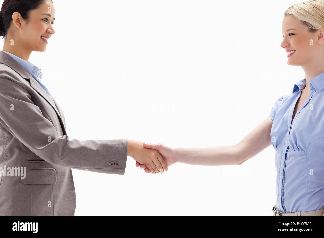 Close-up of women shaking hands Stock Photo - Alamy