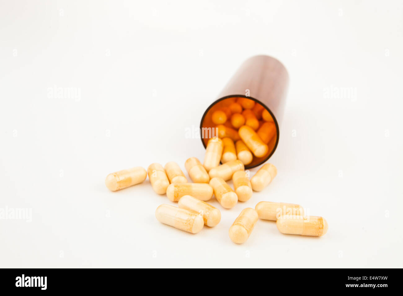 Bottle of medication knocked over Stock Photo - Alamy