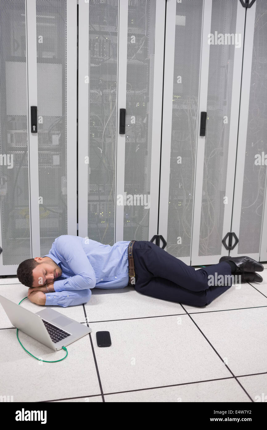 Man napping in data center Stock Photo - Alamy