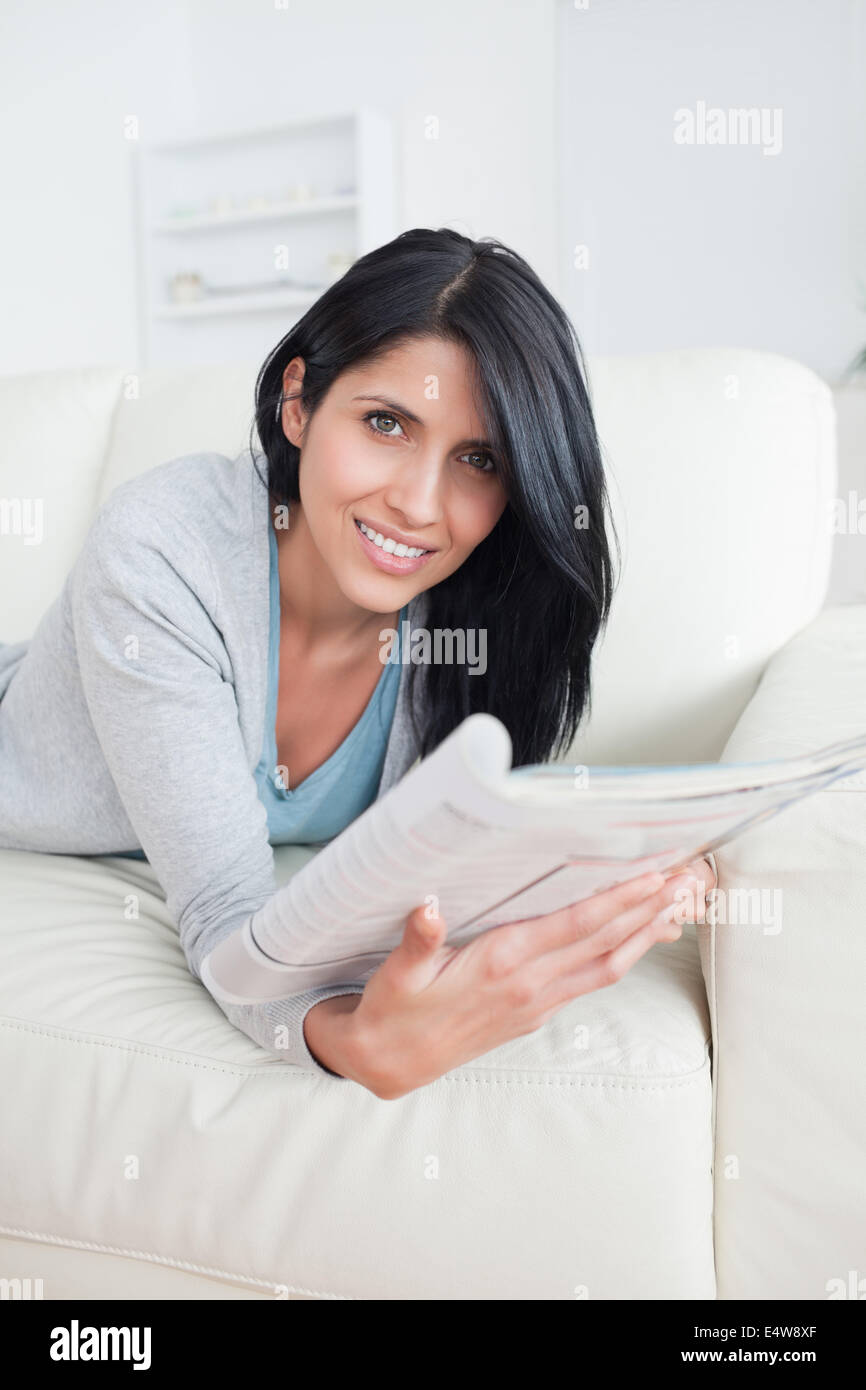 Woman lies on couch hi-res stock photography and images - Alamy