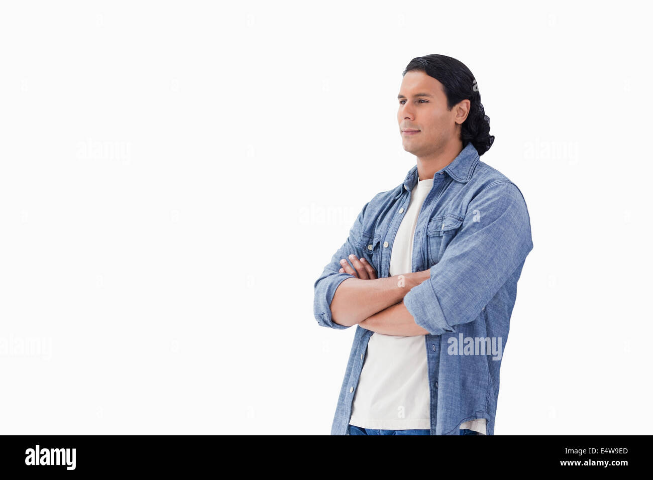 Close-up of a man crossing his arms Stock Photo - Alamy