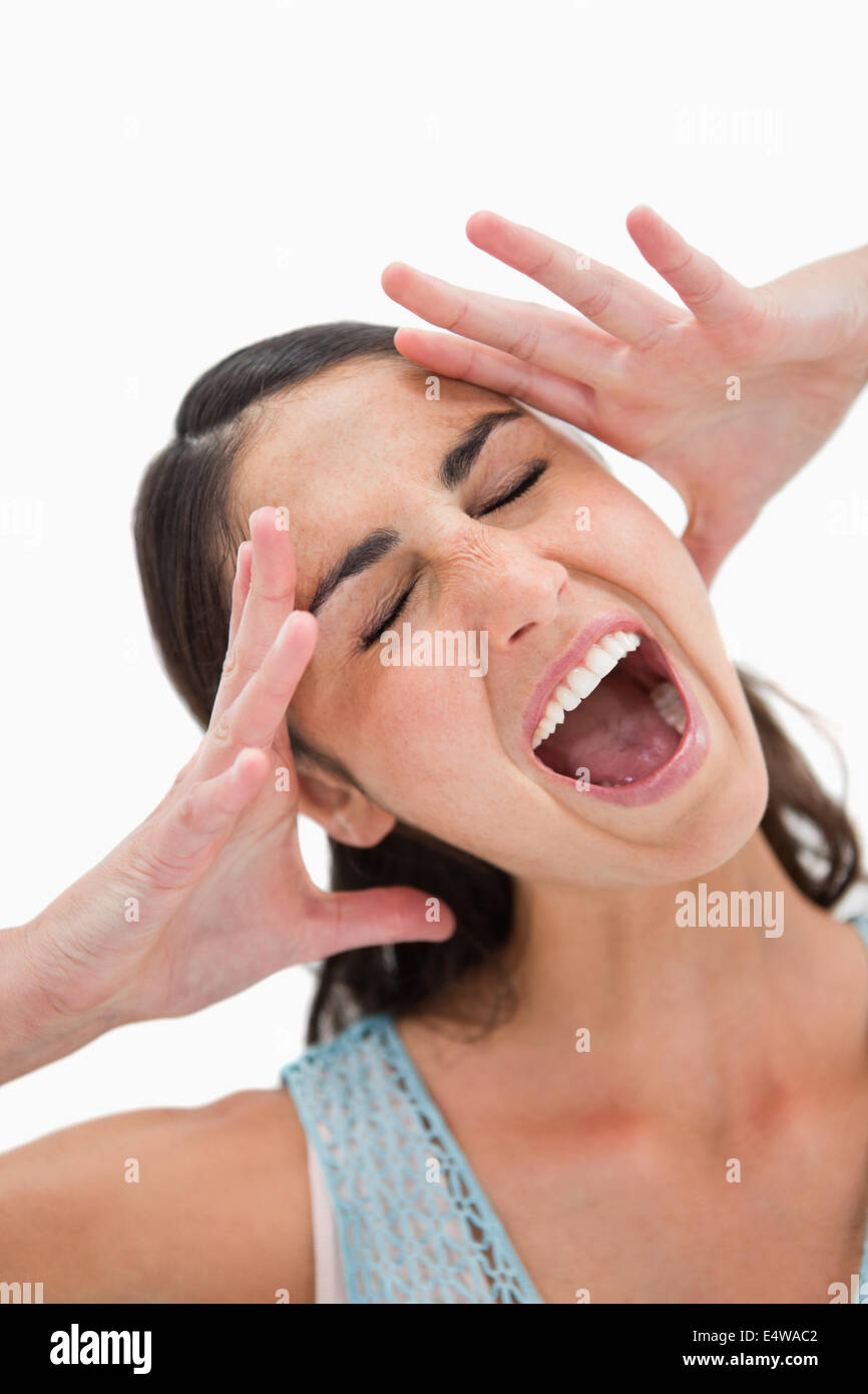 Portrait of a woman shouting Stock Photo - Alamy