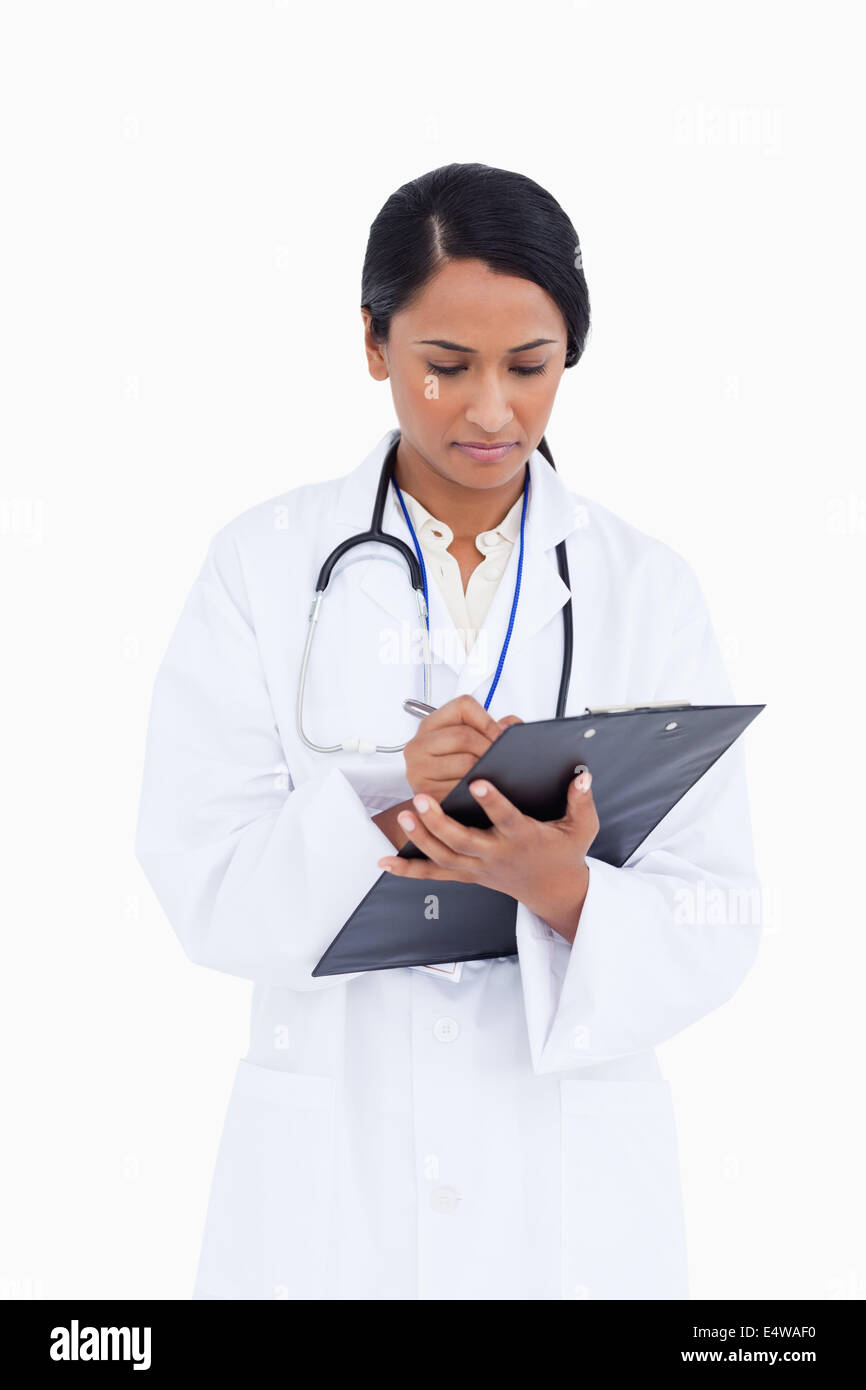 Doctor taking notes hospital Cut Out Stock Images & Pictures - Alamy
