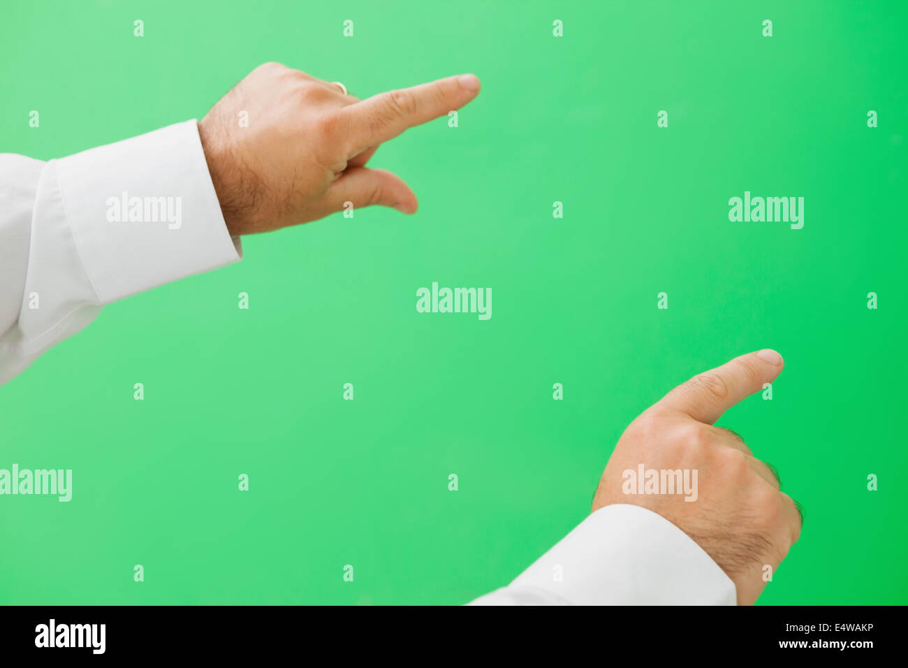 Hands pointing green copy hi-res stock photography and images - Alamy