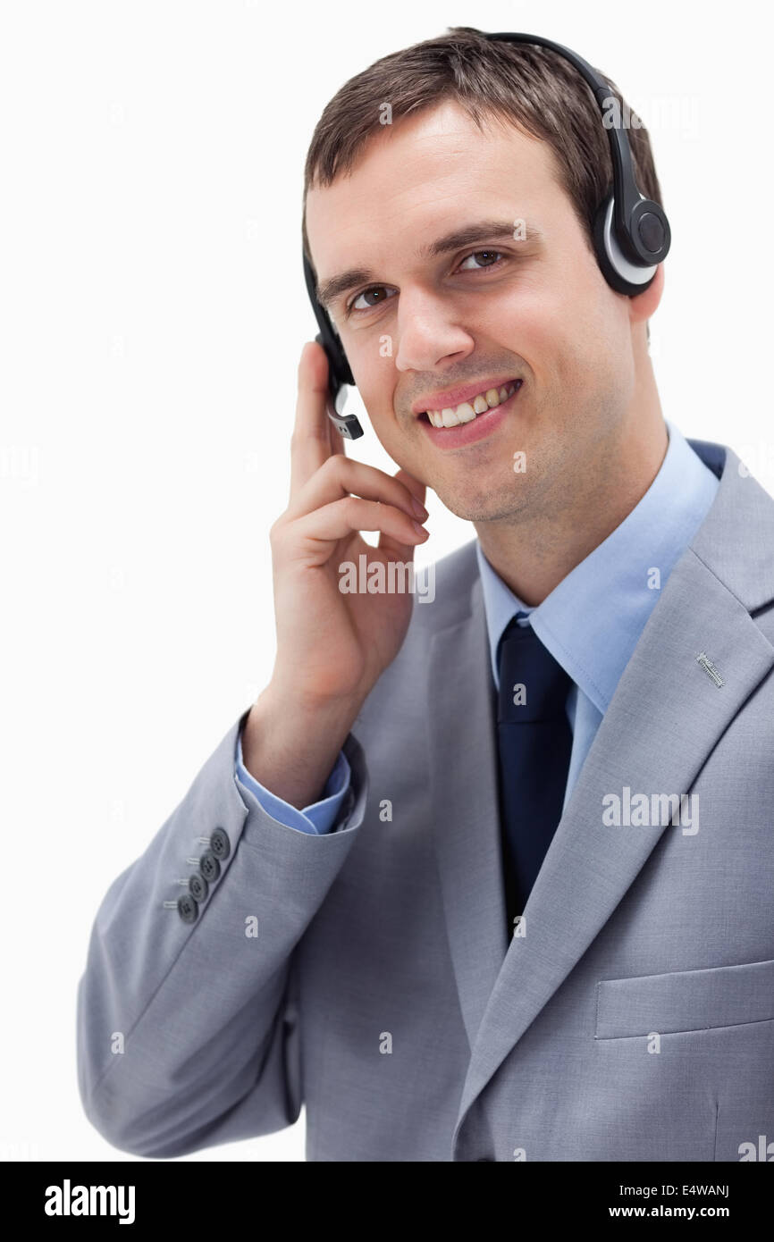 Businessman using headset Stock Photo - Alamy
