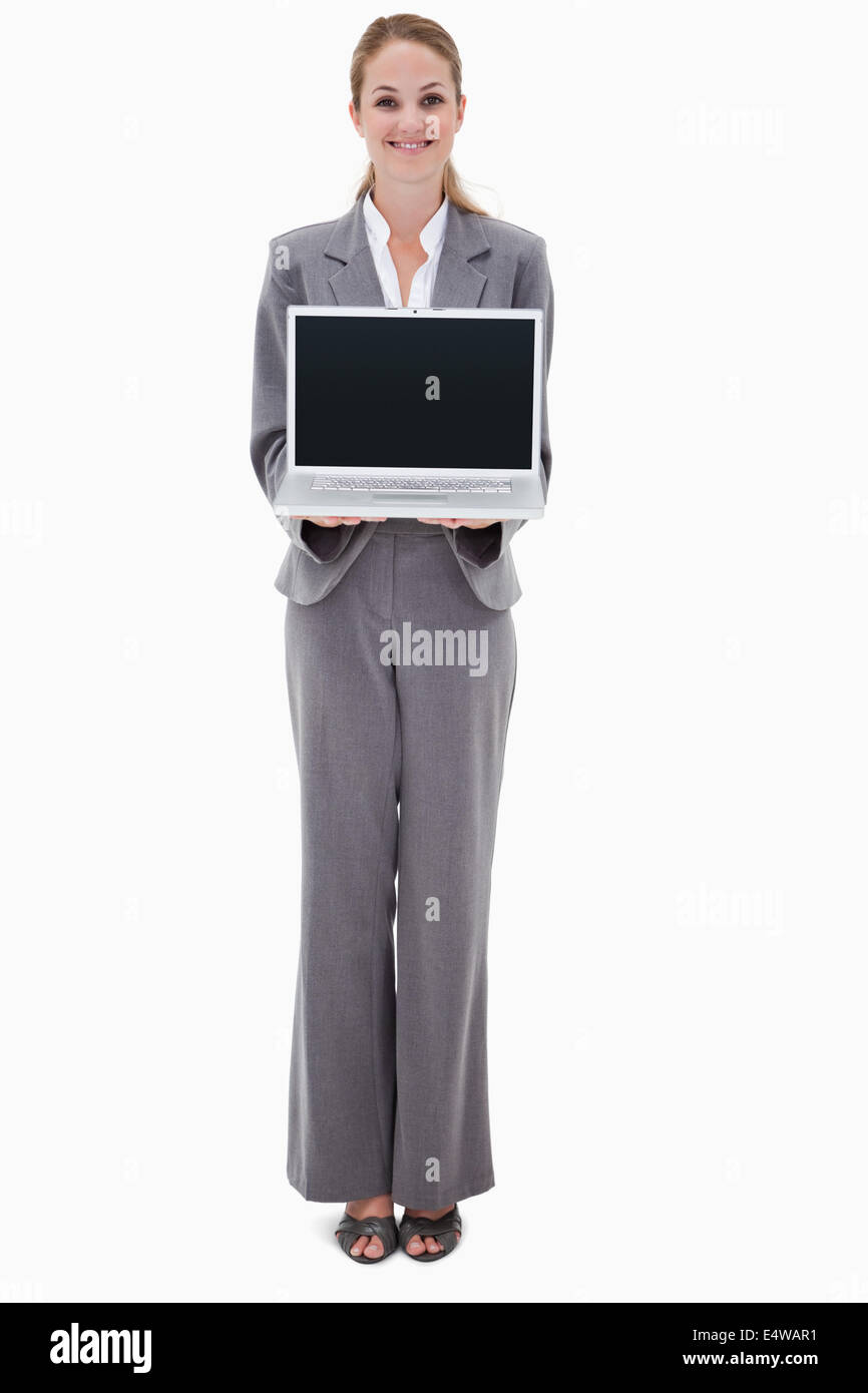 Smiling bank employee presenting her laptop Stock Photo - Alamy