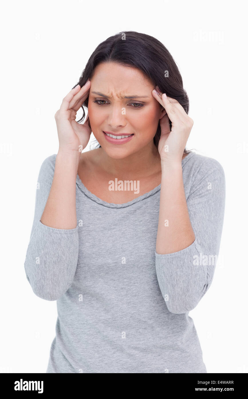 Close up woman rubbing temples hi-res stock photography and images - Alamy